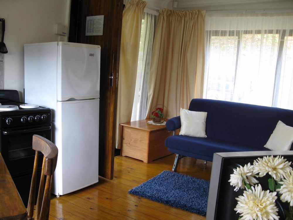 Cozy Cabins - Selfsorg Hout Huise in Southport - Vakansie Verblyf op ...