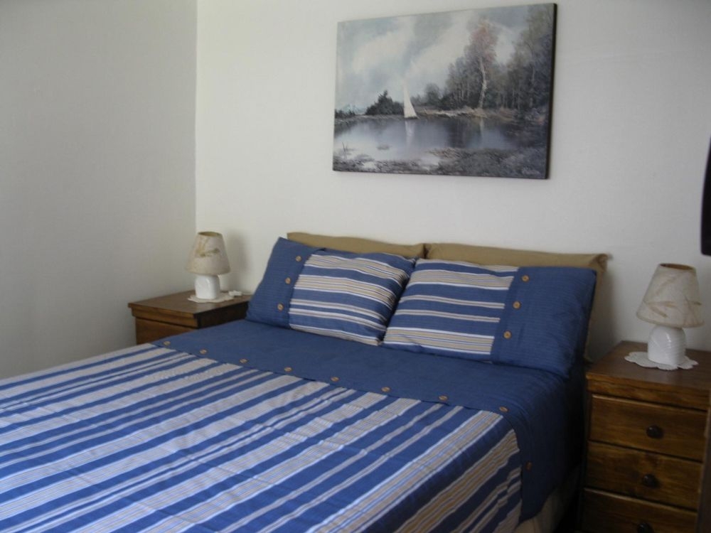 Cozy Cabins - Selfsorg Hout Huise in Southport - Vakansie Verblyf op ...