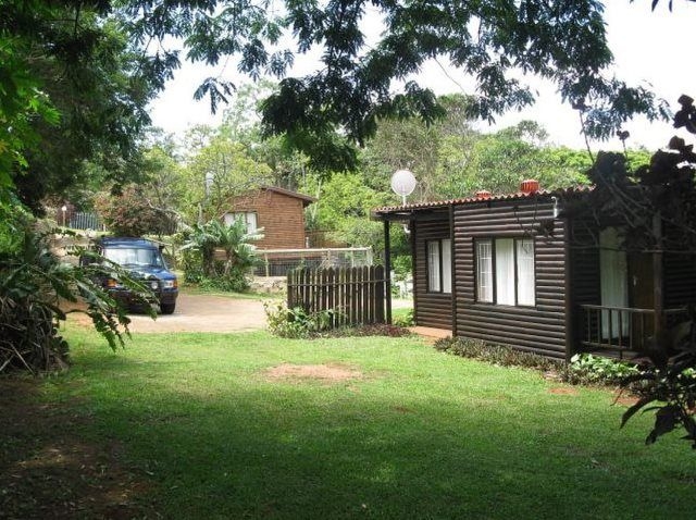 Cozy Cabins - Selfsorg Hout Huise in Southport - Vakansie Verblyf op ...